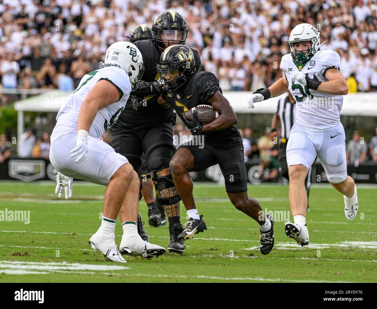 Orlando, FL, USA. 30th Sep, 2023. UCF running back RJ Harvey (7) runs ...