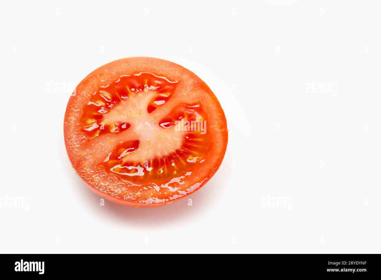 Fresh sliced tomato isolated on white background Stock Photo - Alamy