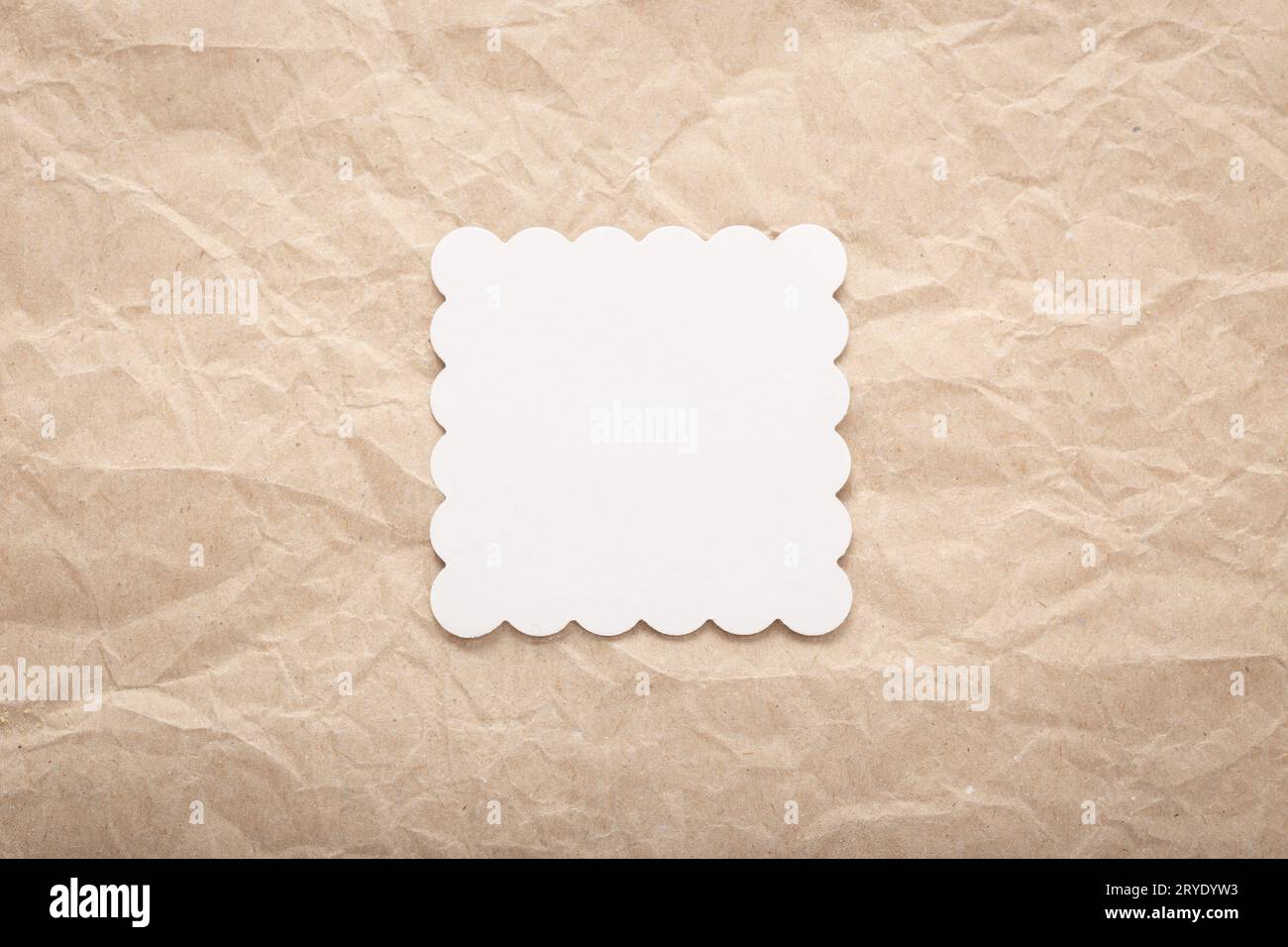 Mockup template of white cardboard card on crumpled paper Stock Photo ...