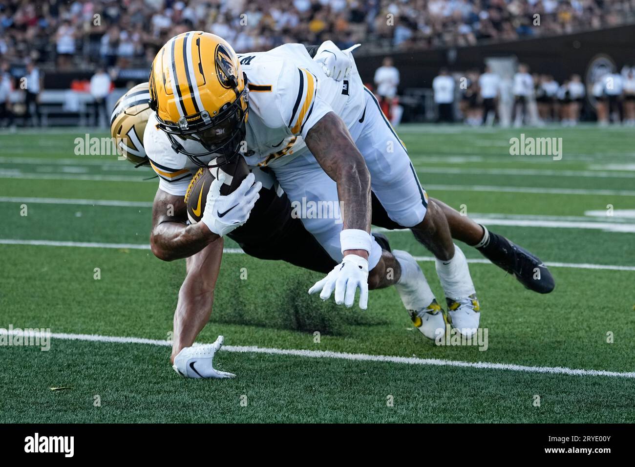 Missouri wide receiver Theo Wease Jr. (1) dives into the end zone for a ...