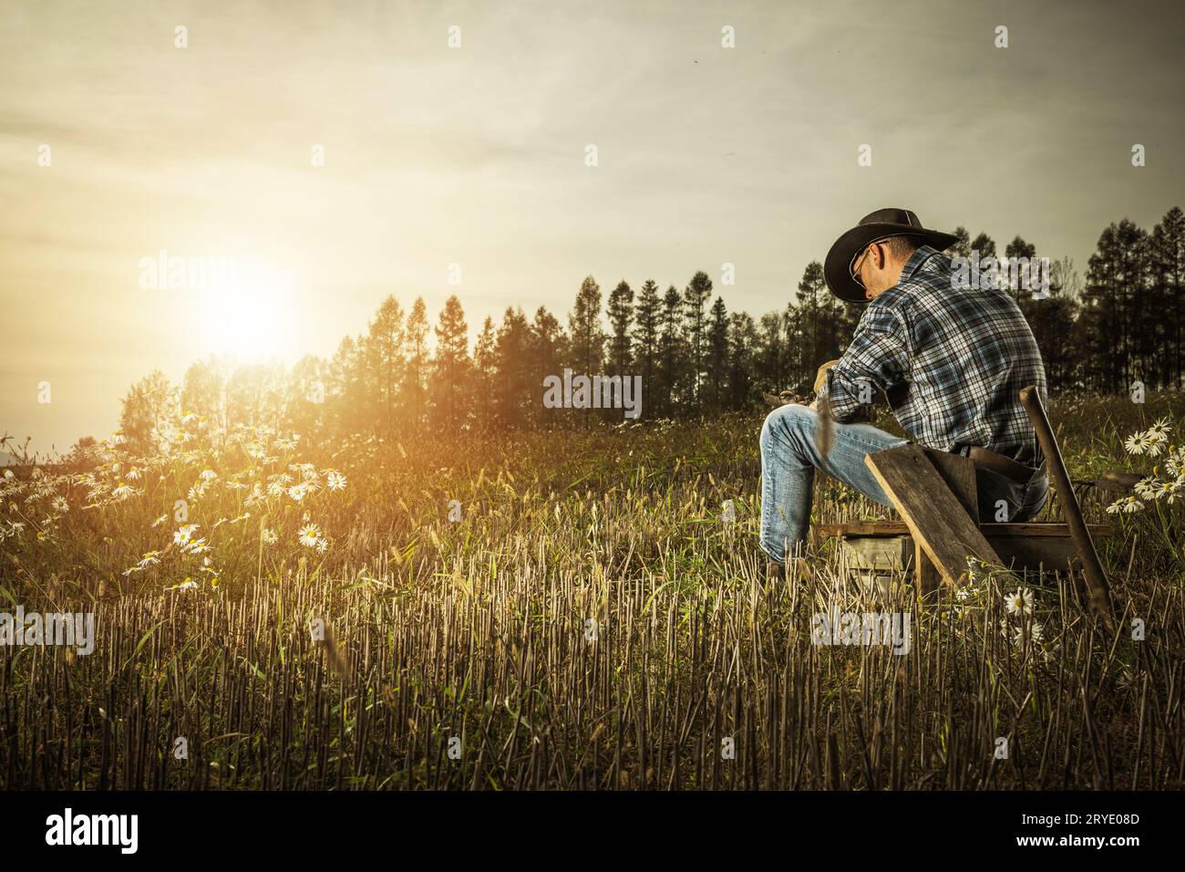 Caucasian Cowboy Enjoying His Countryside Life During Scenic Sunset ...