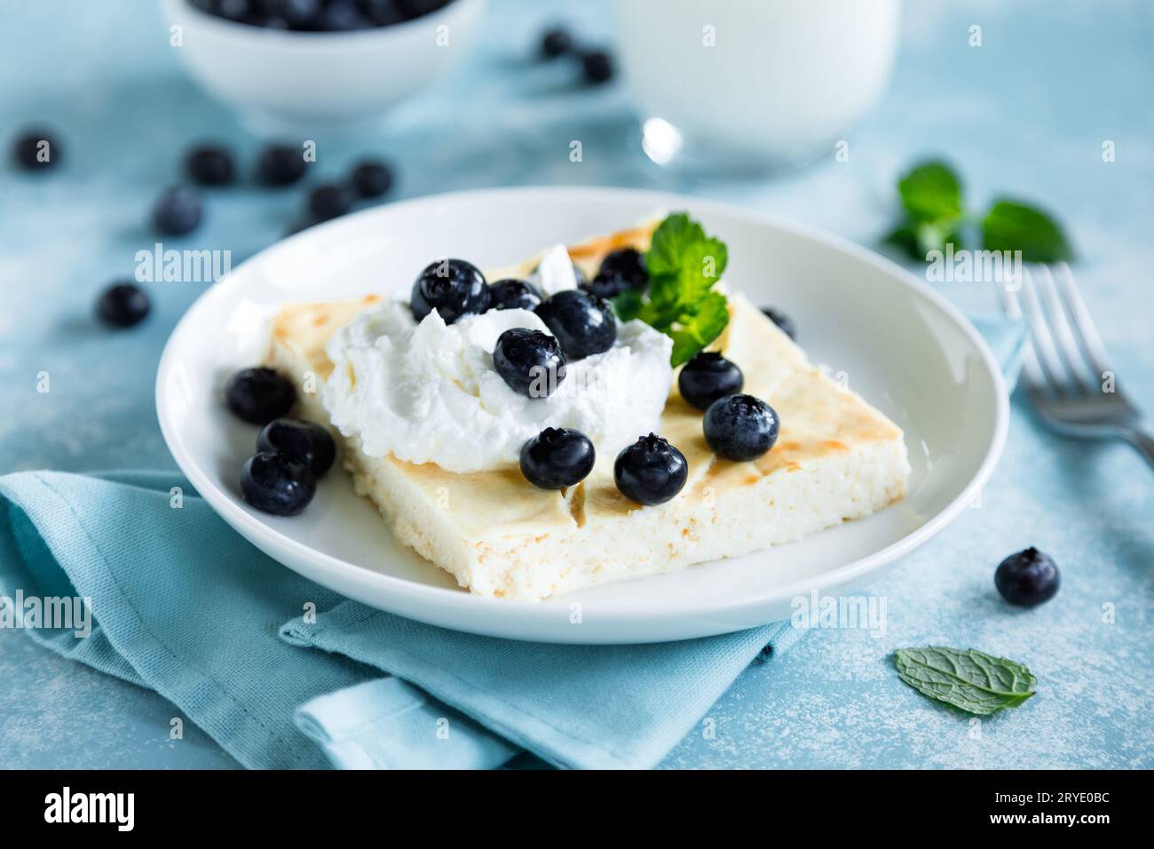 Cottage cheese cheesecake slice with fresh blueberry Stock Photo - Alamy