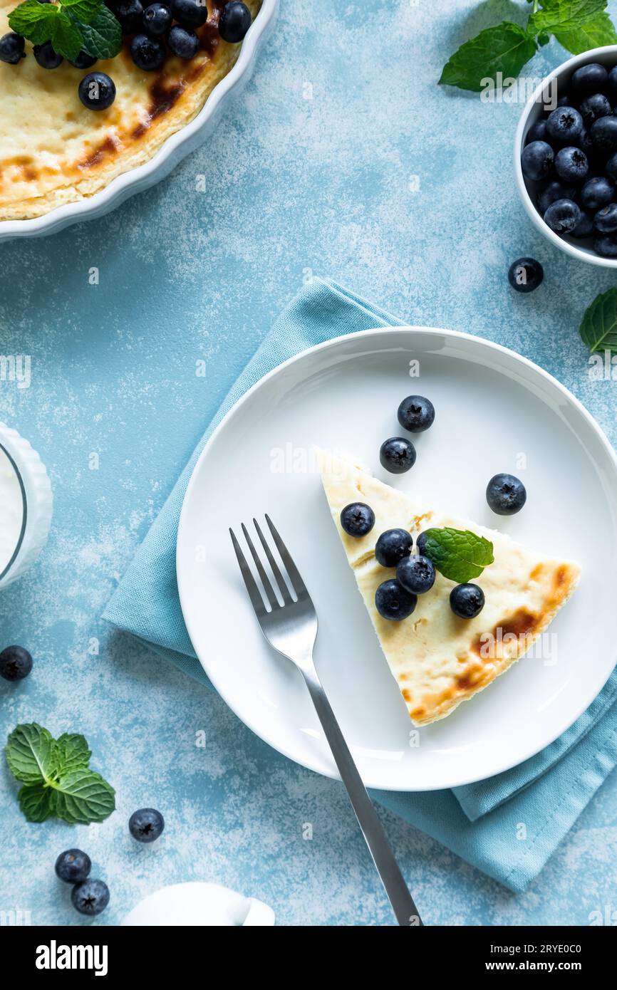 Cottage cheese cheesecake slice with fresh blueberry, top down view ...