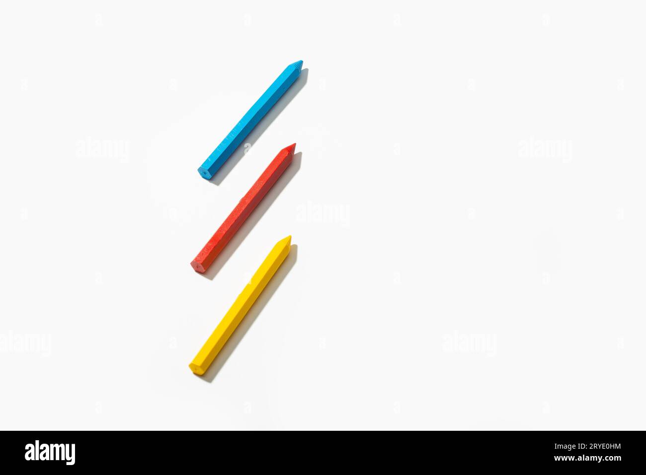 Colored crayons isolated on white background Stock Photo - Alamy