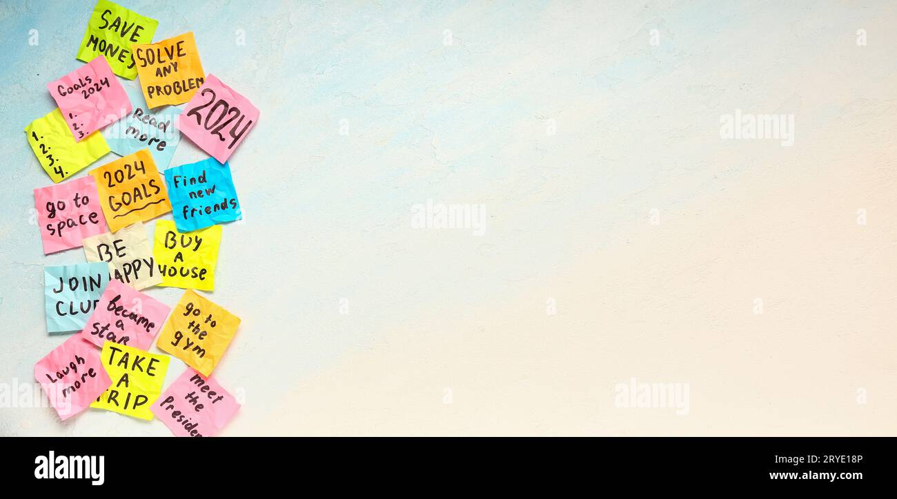 Note papers with written goals for new year 2024 on light background ...