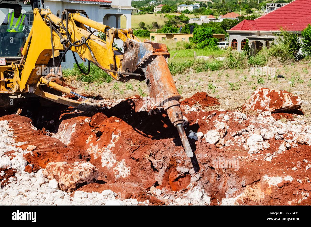 Jackhammer Attached To Backhoe Arm Stock Photo - Alamy