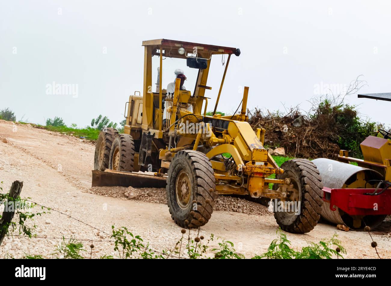 Road Construction Grader On Work Site Stock Photo - Alamy