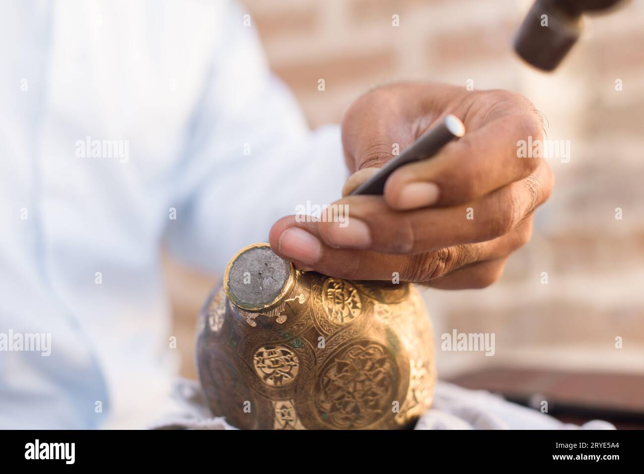 Chaser of copper at work Stock Photo - Alamy