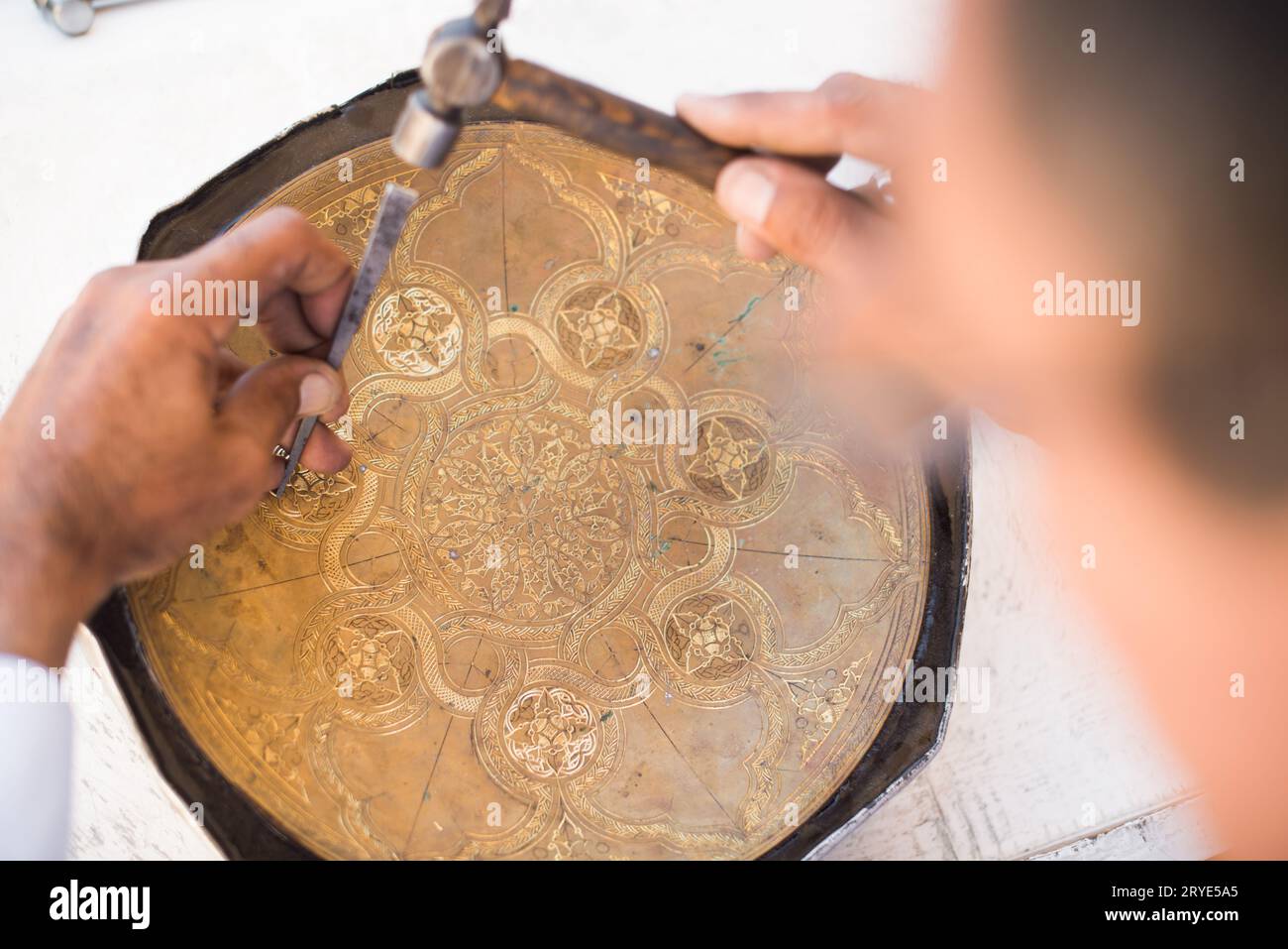 Chaser of copper at work Stock Photo - Alamy