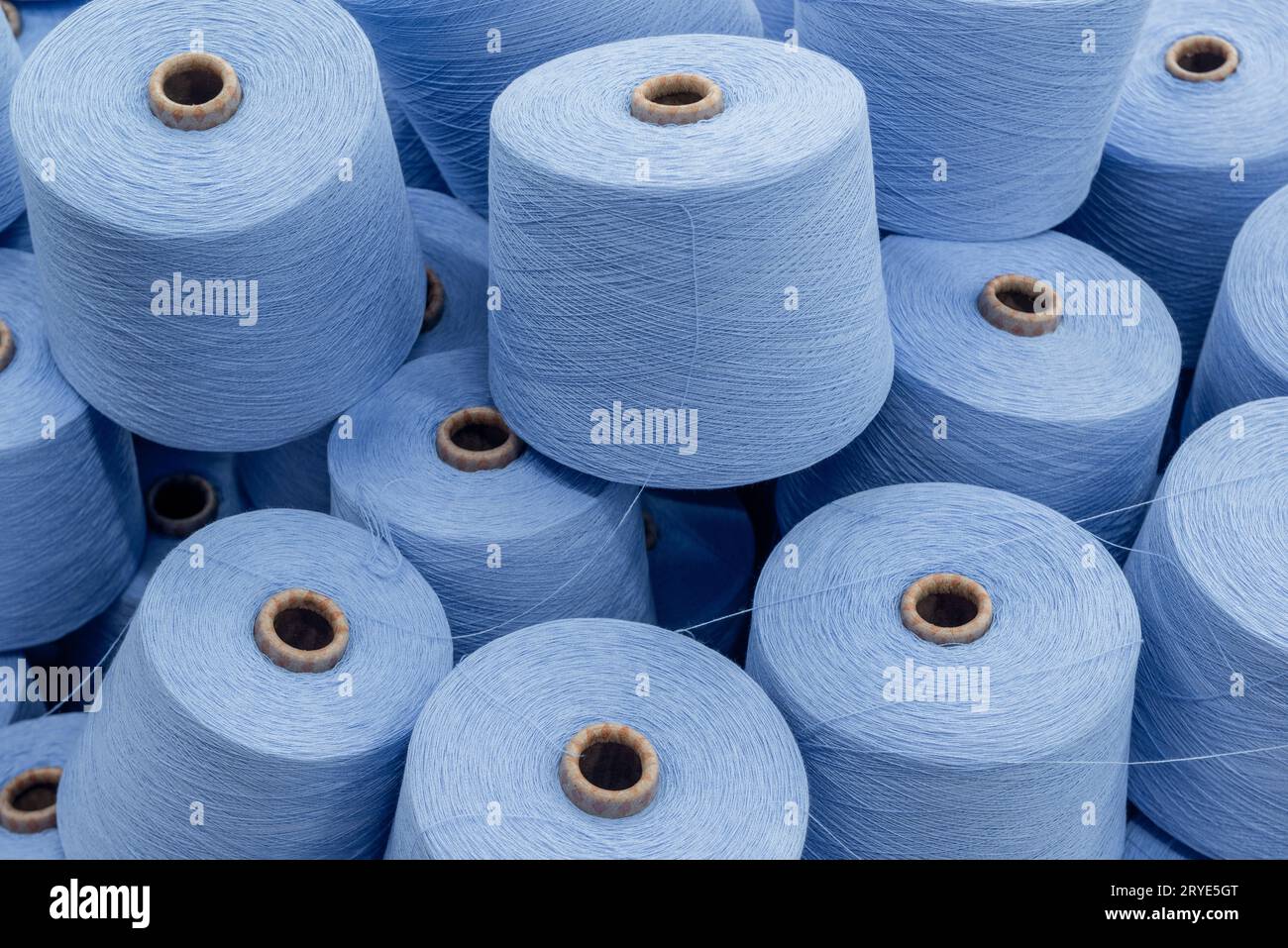 Coils of textile yarns Stock Photo - Alamy