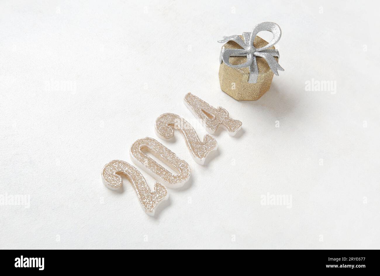Figure 2024 with gift box on white background Stock Photo - Alamy