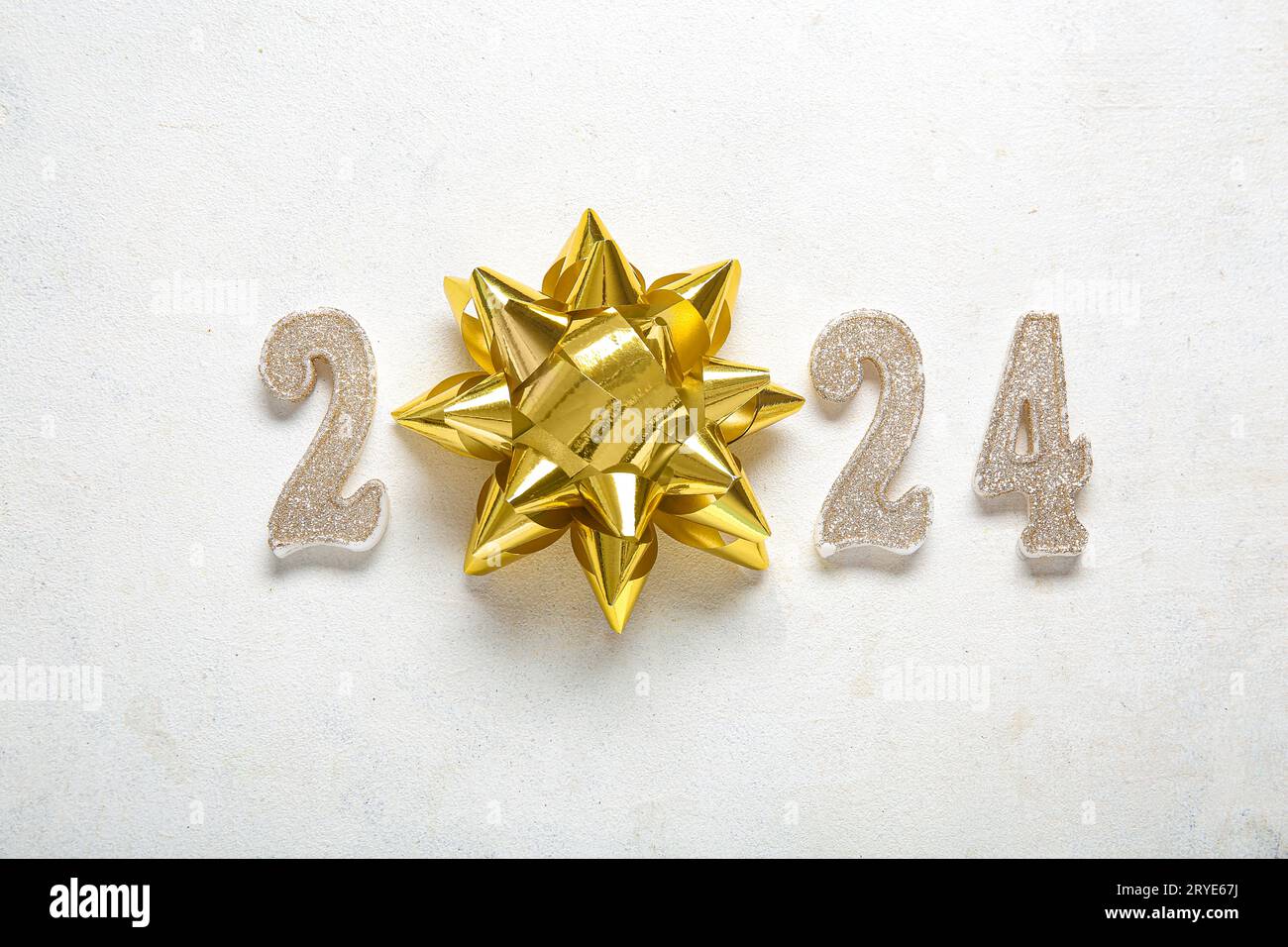 Figure 2024 with bow on white background Stock Photo - Alamy