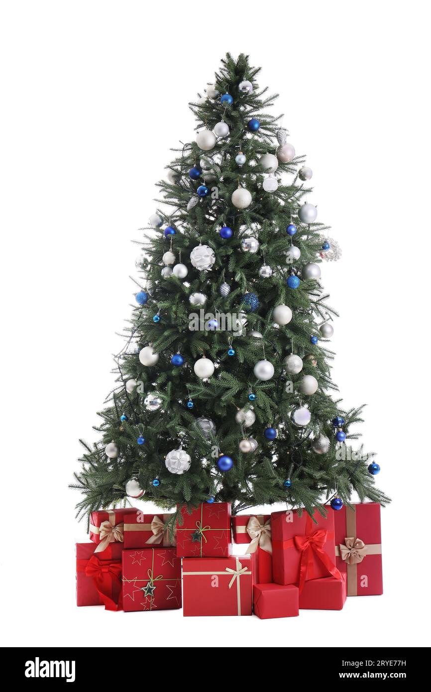 Gift boxes under Christmas tree isolated on white background Stock ...
