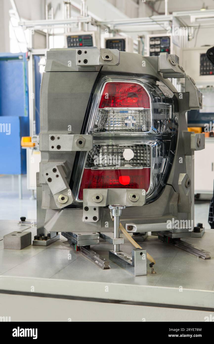 Equipment for the manufacture of car headlights Stock Photo - Alamy