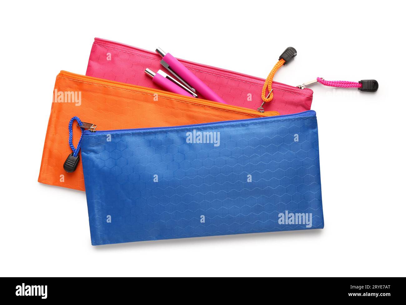 Colorful pencil cases on white background Stock Photo - Alamy