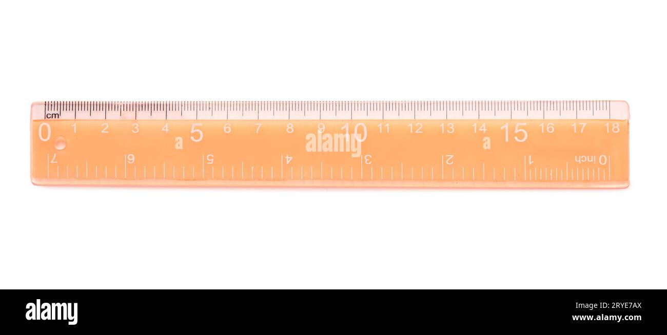 Orange plastic ruler on white background Stock Photo - Alamy