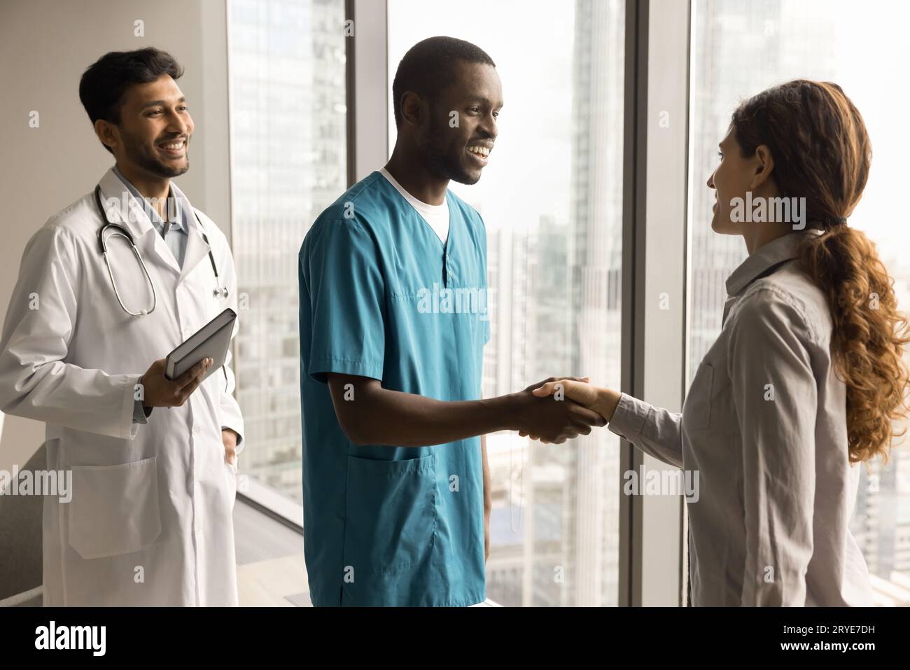 African american doctor shaking hands hi-res stock photography and ...