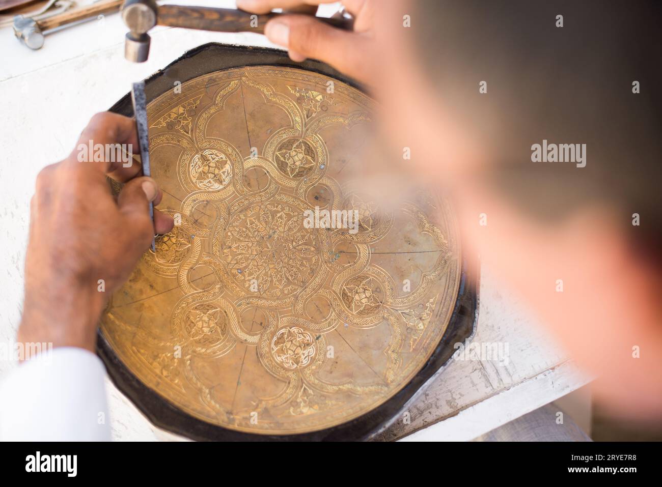 Chaser of copper at work Stock Photo - Alamy