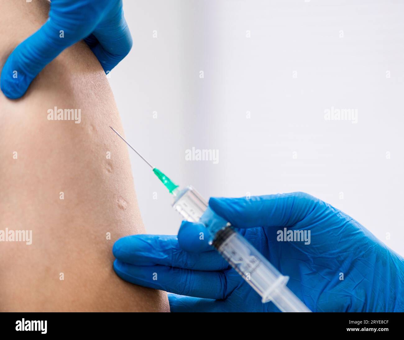 Closeup doctor vaccination injection hi-res stock photography and images - Alamy
