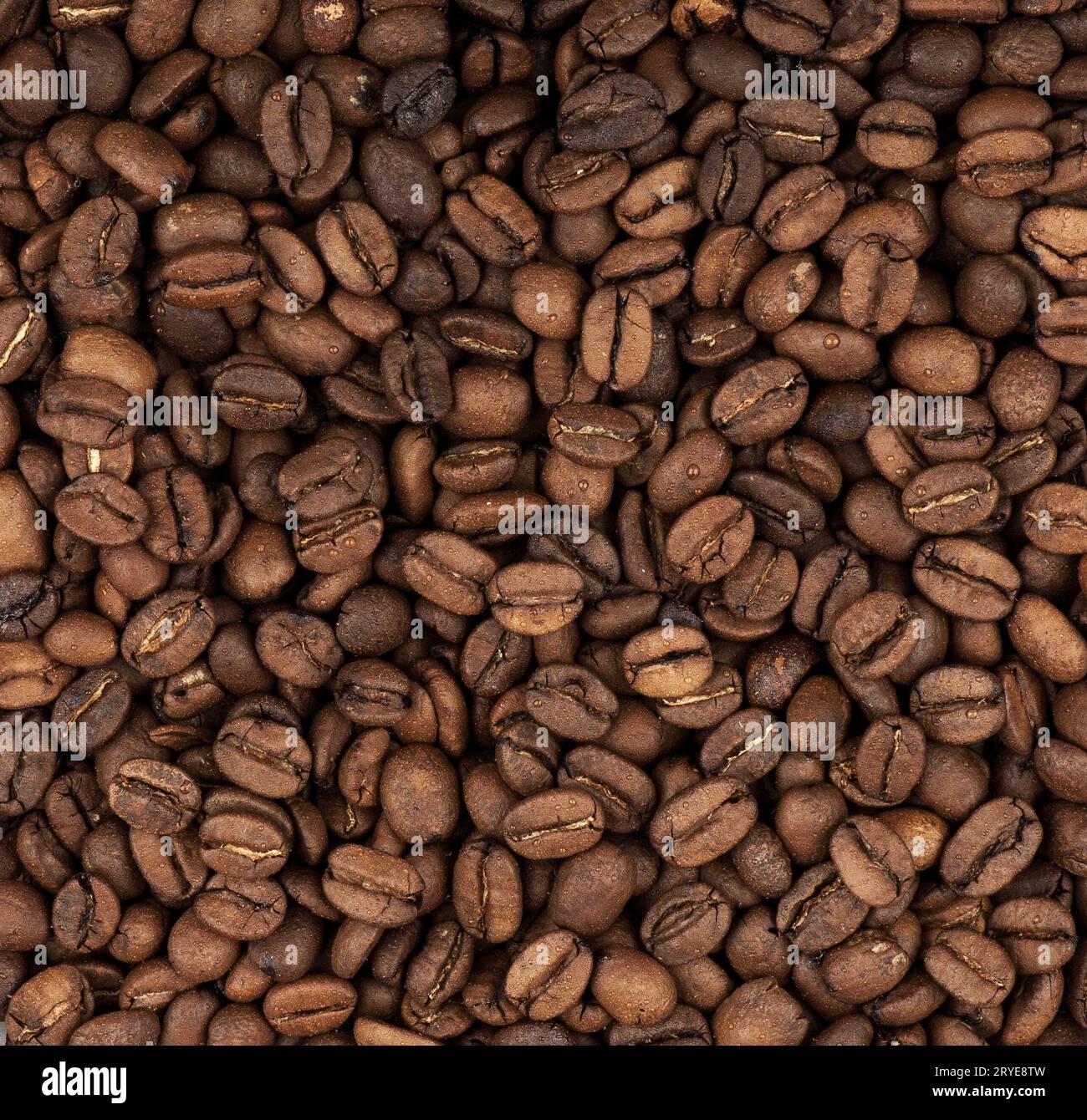 Dark fried coffee beans hi-res stock photography and images - Alamy