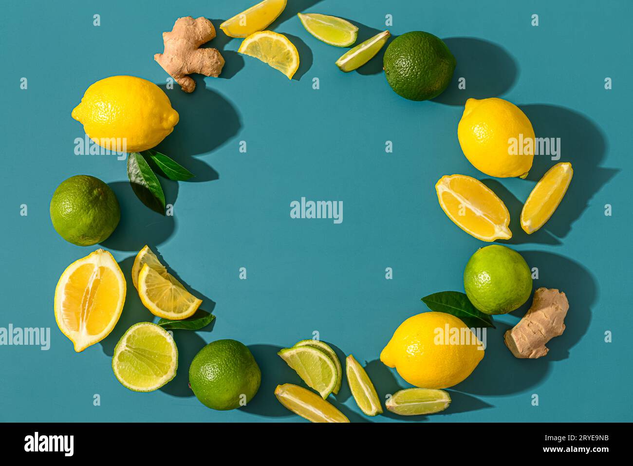 Frame made of ingredients for preparing lemonade on blue background ...