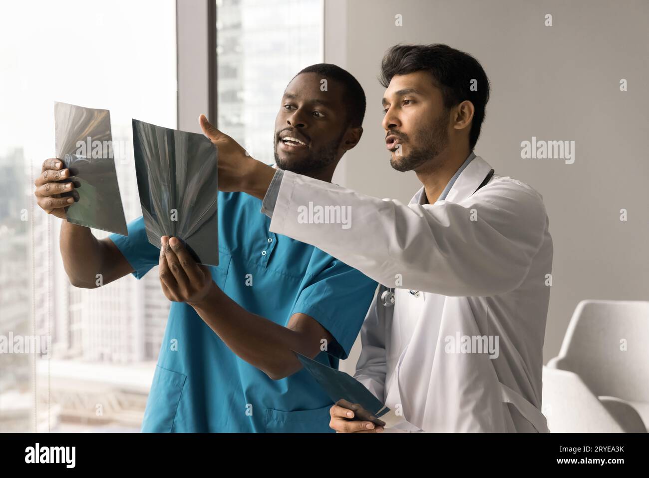 Doctor nurse reviewing test result hi-res stock photography and images ...