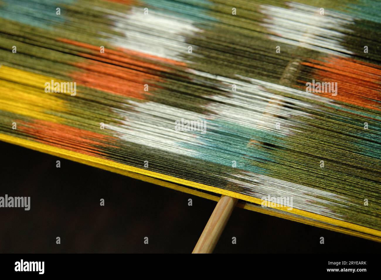 Production and weaving of carpets and fabrics Stock Photo - Alamy