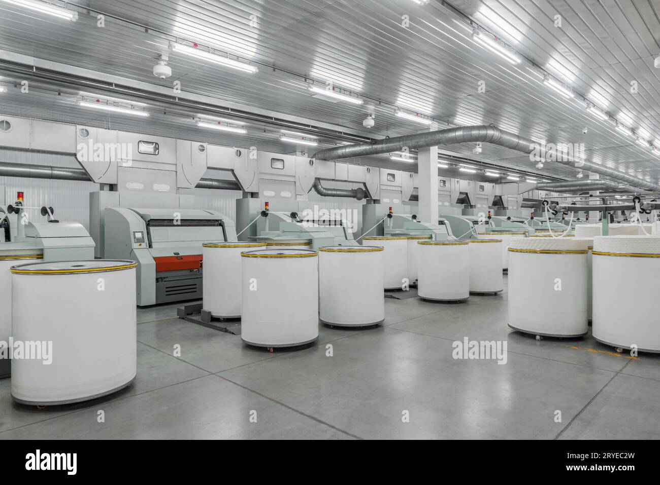 Production of threads in a textile factory Stock Photo - Alamy