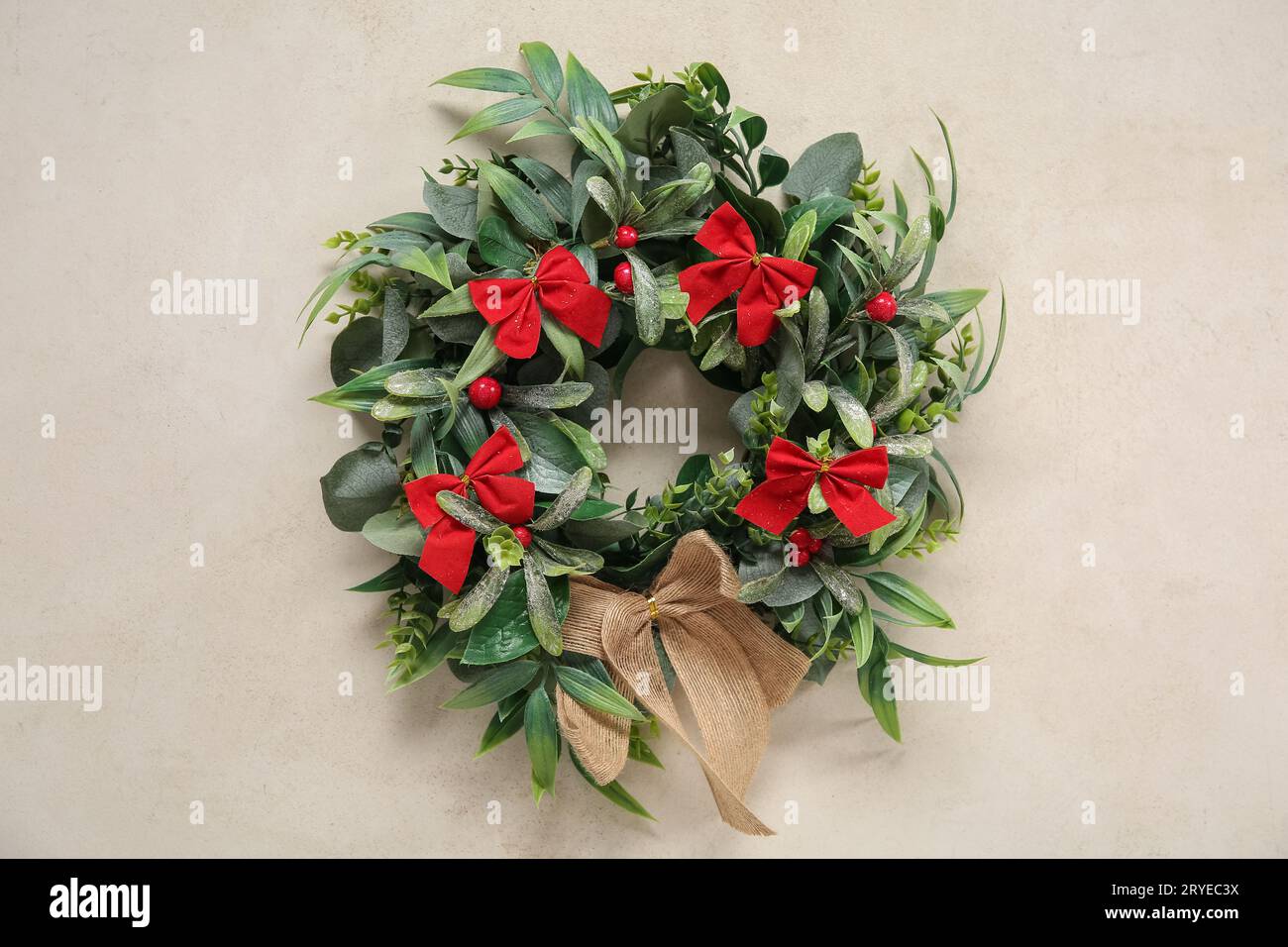 Beautiful mistletoe wreath on white background Stock Photo - Alamy
