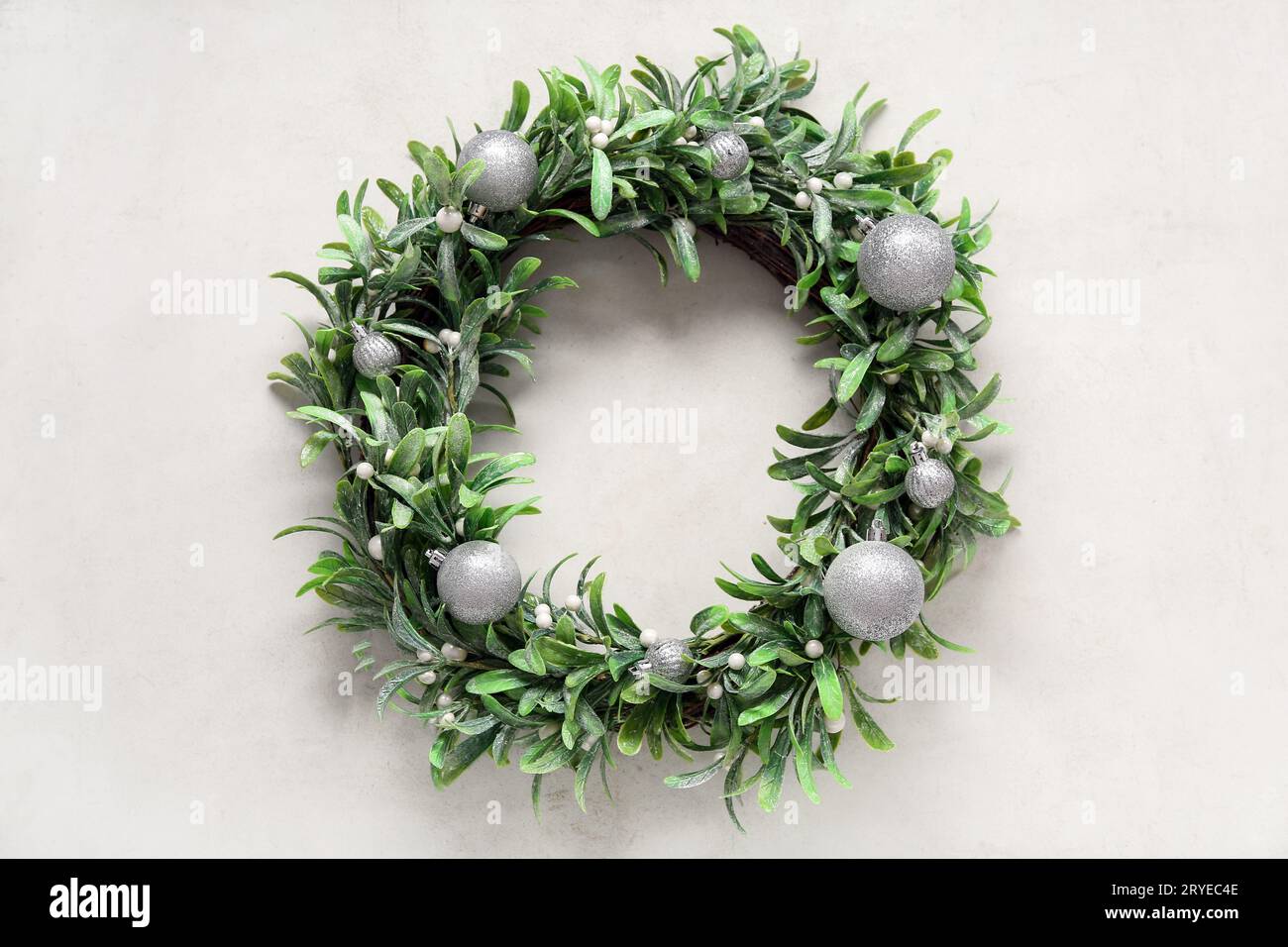 Beautiful mistletoe wreath on white background Stock Photo - Alamy