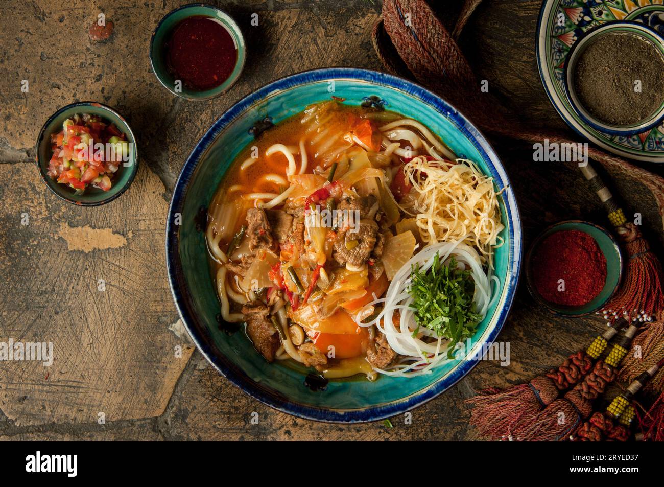 Meat dish on an old paving stone Stock Photo - Alamy