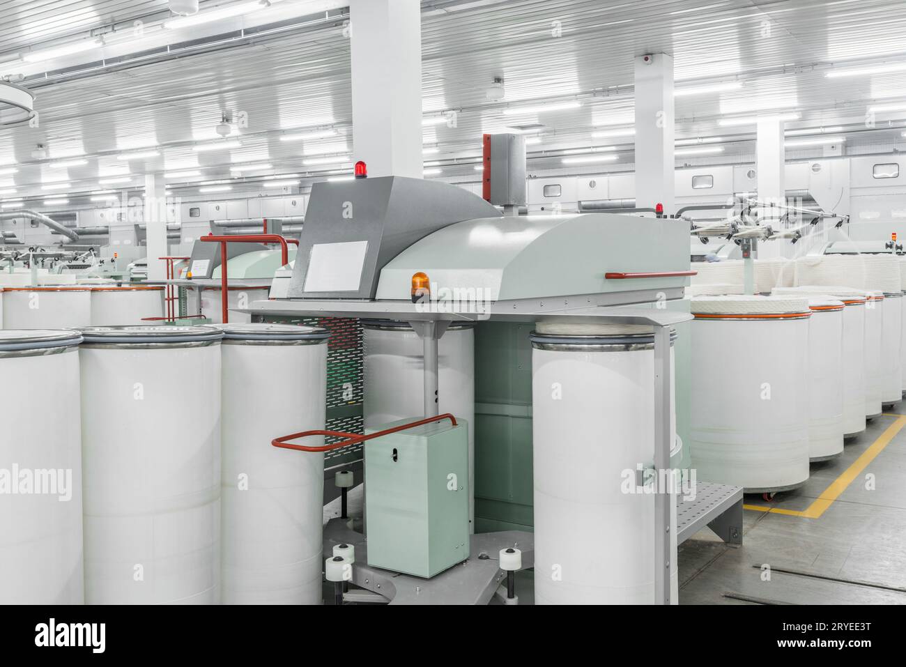 Production of threads in a textile factory Stock Photo - Alamy