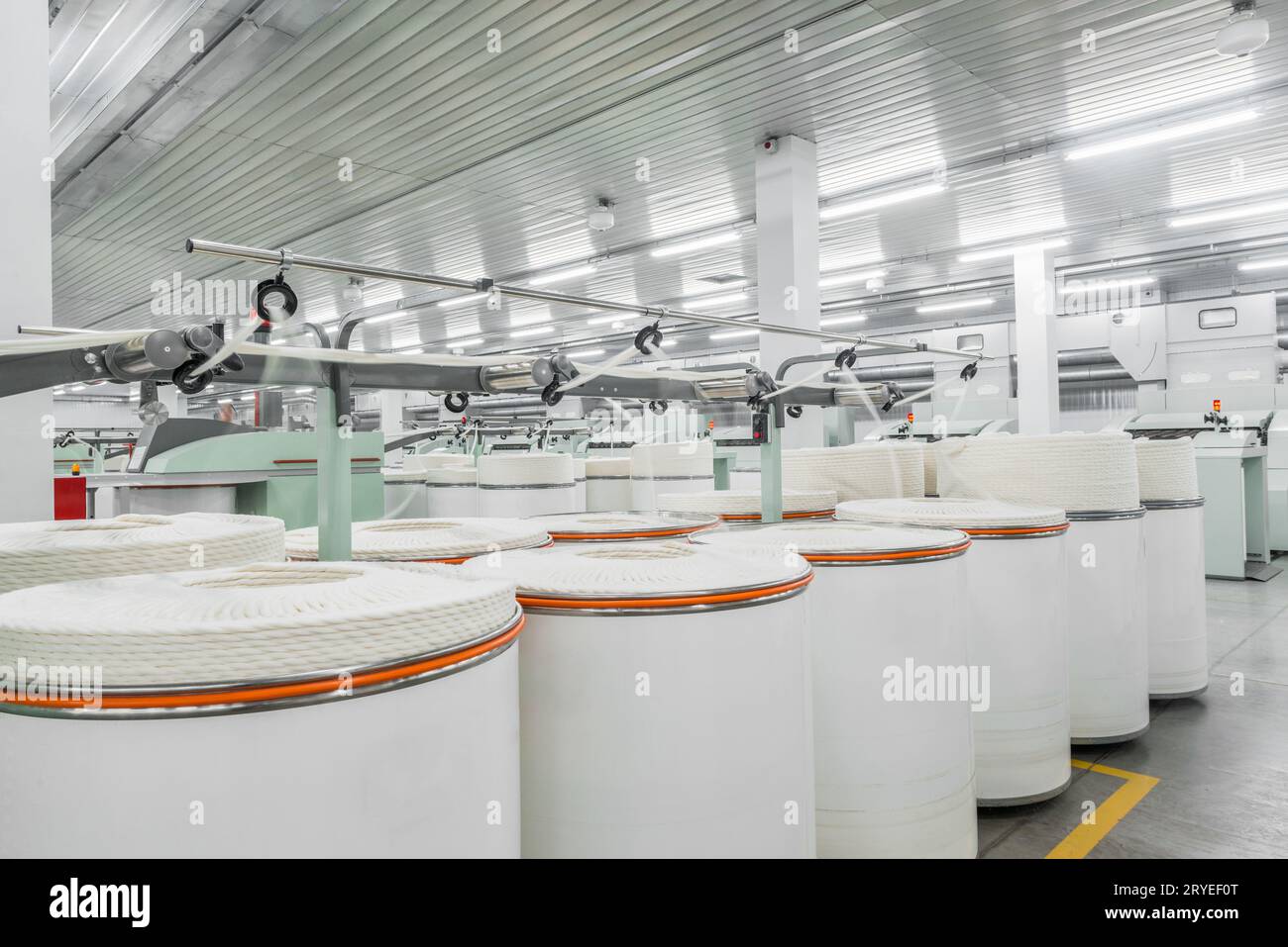 Production of threads in a textile factory Stock Photo - Alamy