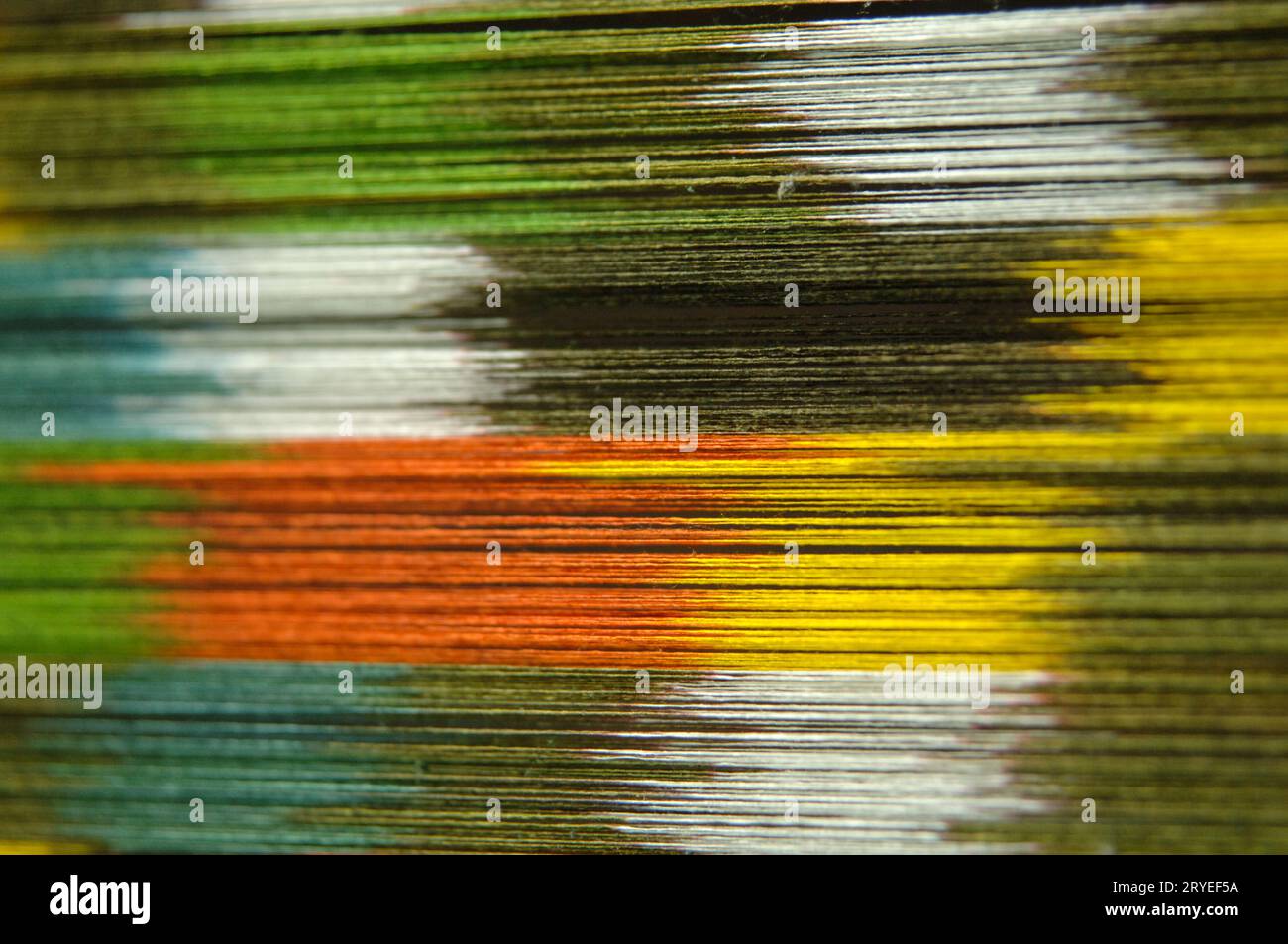 Production and weaving of carpets and fabrics Stock Photo - Alamy