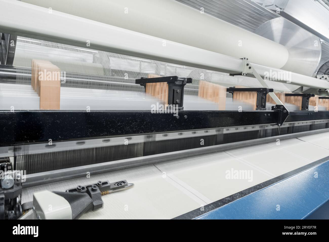 Modern automatic spinning machine Stock Photo - Alamy