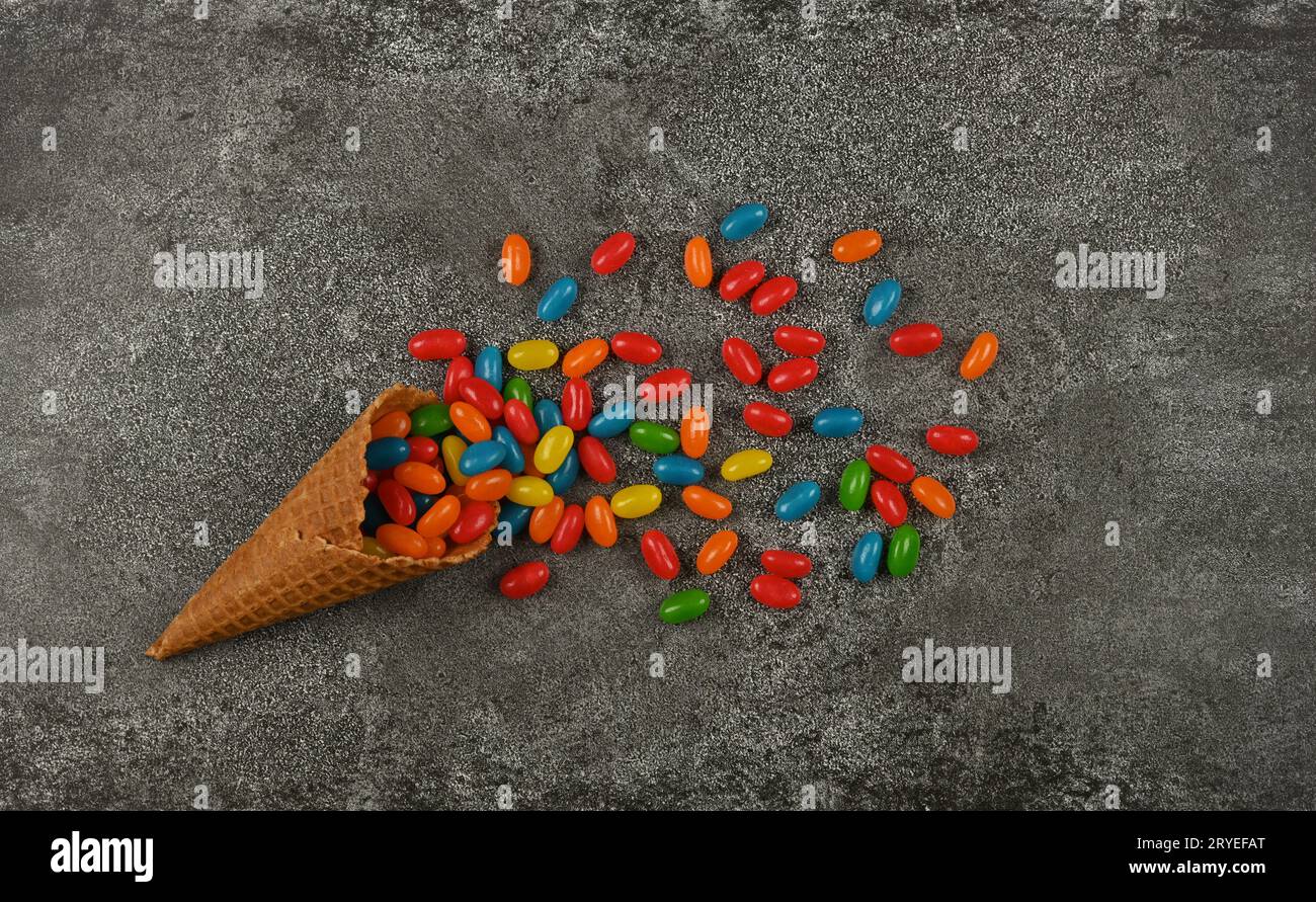 Multicolor jelly beans in wafer ice cream cone Stock Photo - Alamy