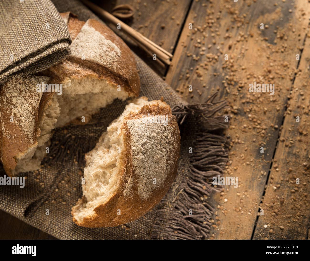 Broken wheat loaf hi-res stock photography and images - Alamy