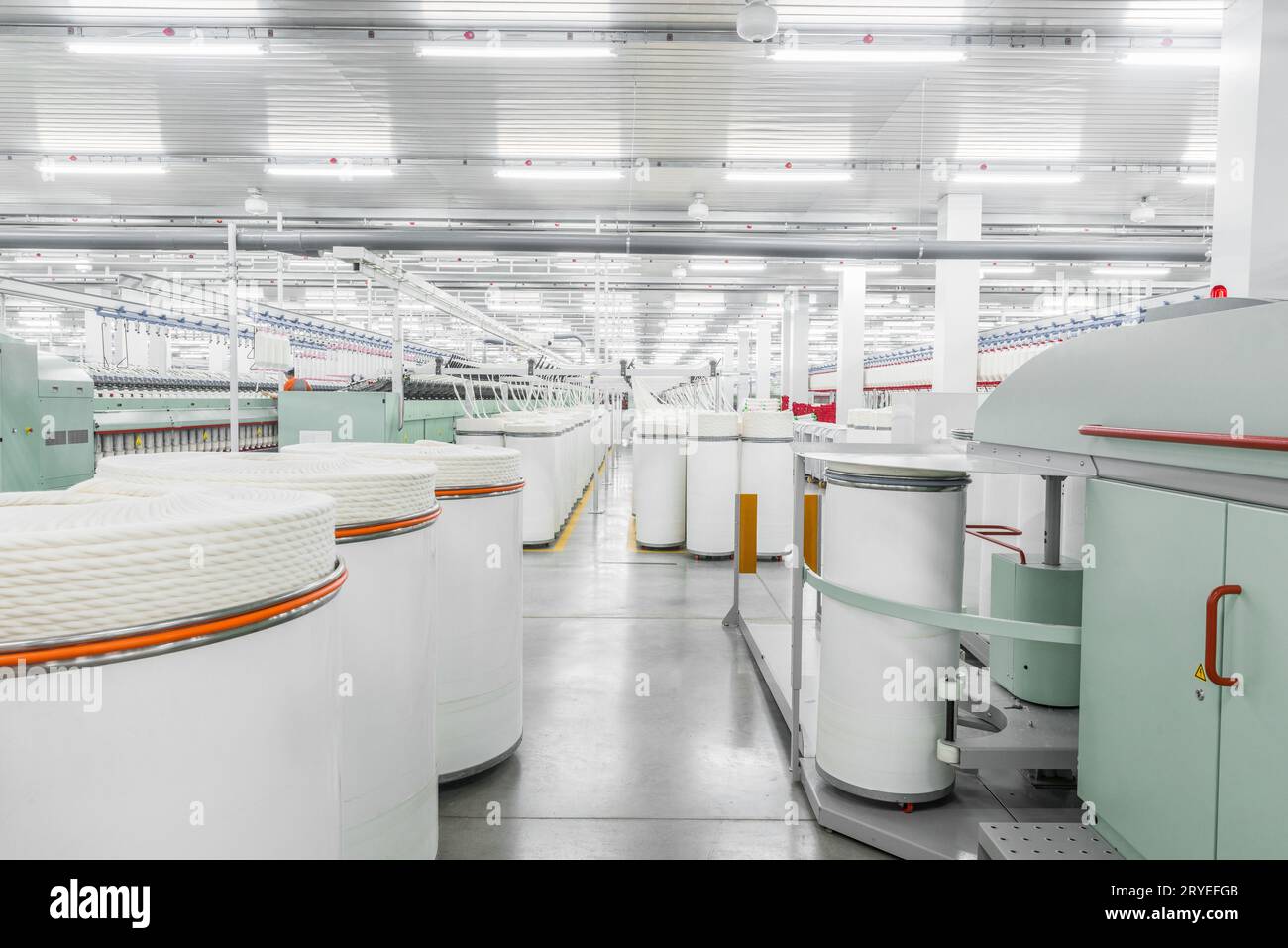 Production of threads in a textile factory Stock Photo - Alamy