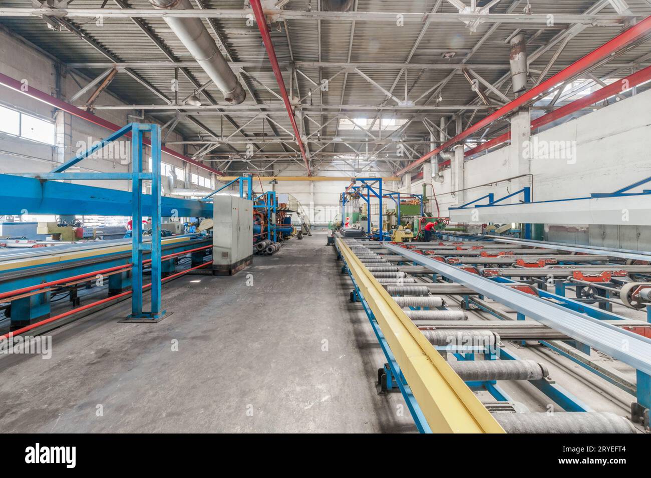 Production of aluminum profiles for windows and doors Stock Photo - Alamy