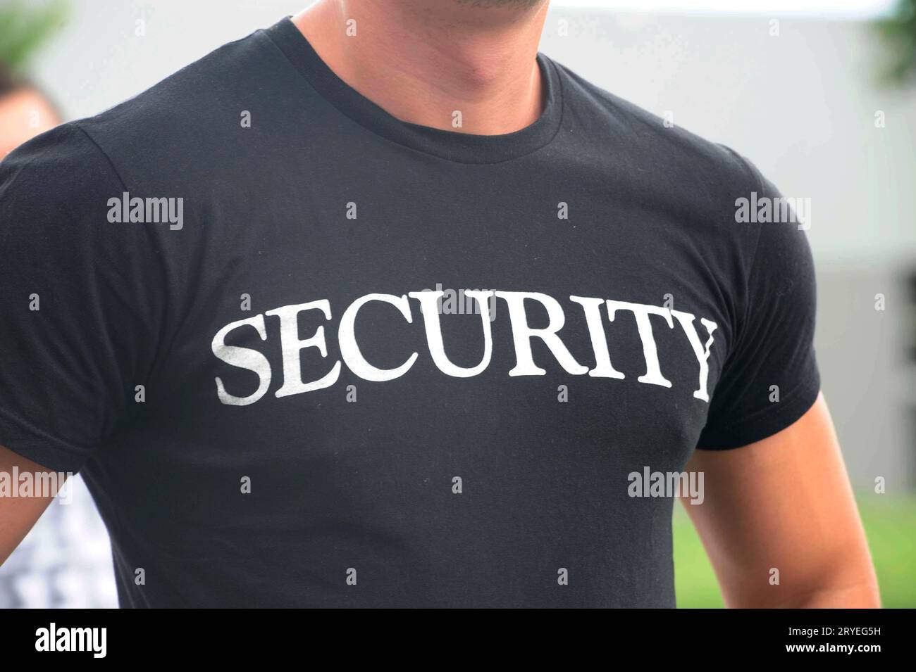 A security guard wearing hi-res stock photography and images - Alamy