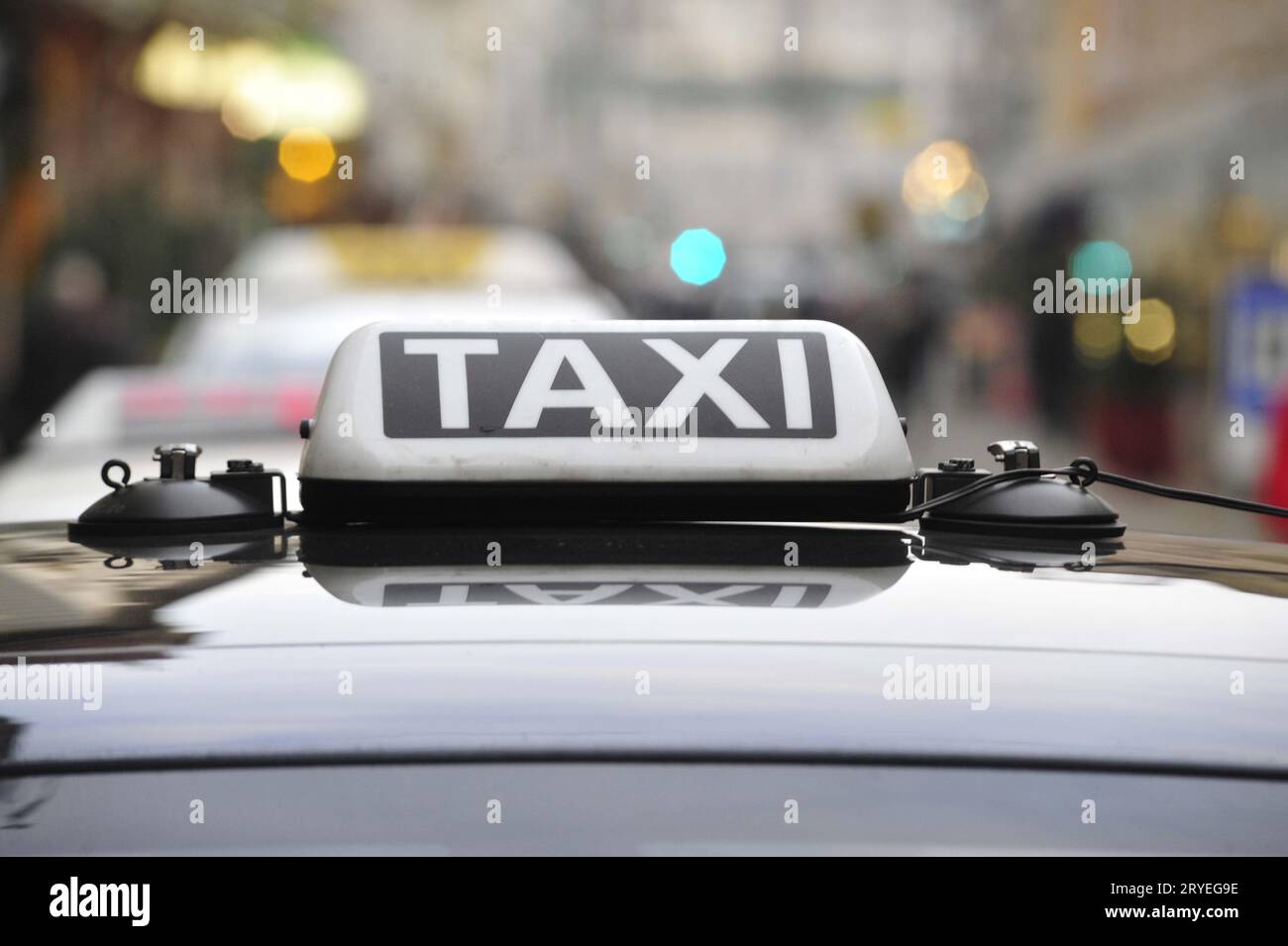 Taxi sign on car roof hi-res stock photography and images - Alamy