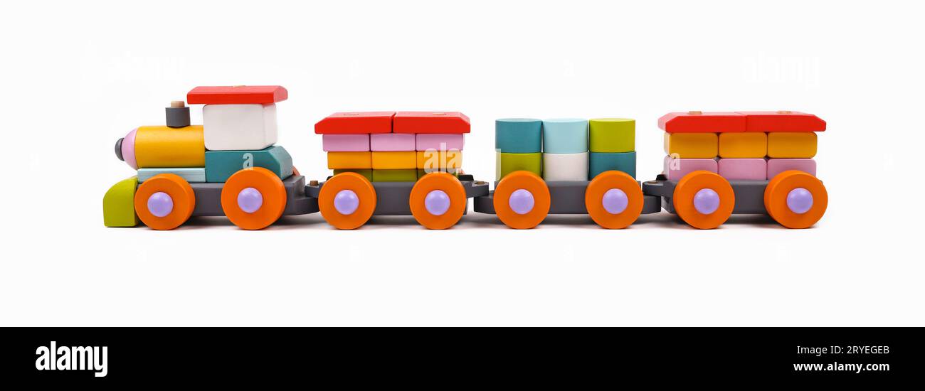 Wooden painted toy train isolated on white Stock Photo - Alamy