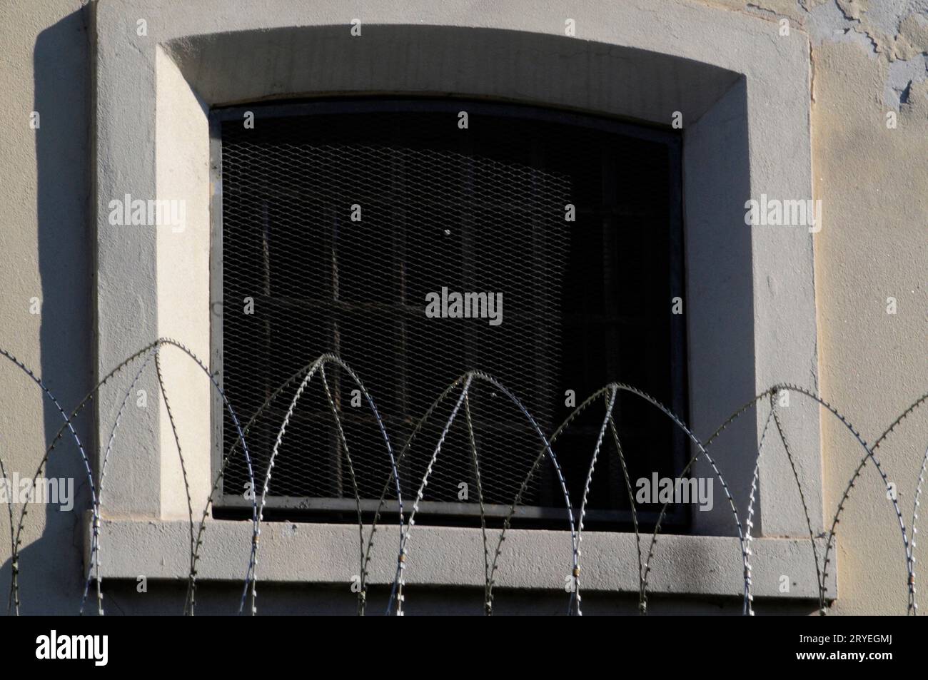 Prison window from the outside Stock Photo - Alamy