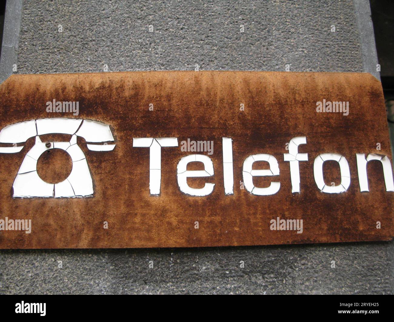 Landline telephone symbol, white, brown background Stock Photo - Alamy