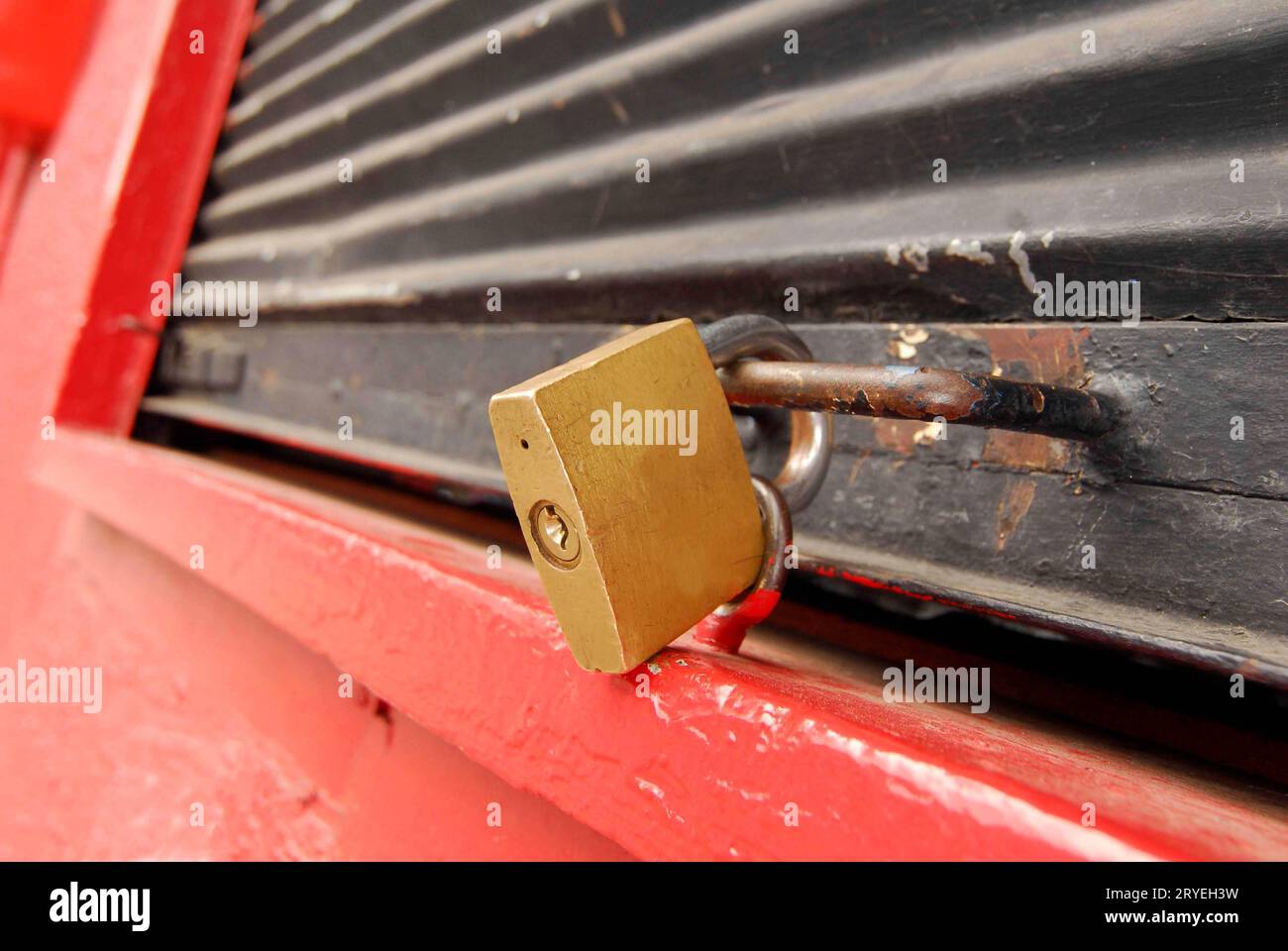 Lock as symbol for closed business Stock Photo - Alamy