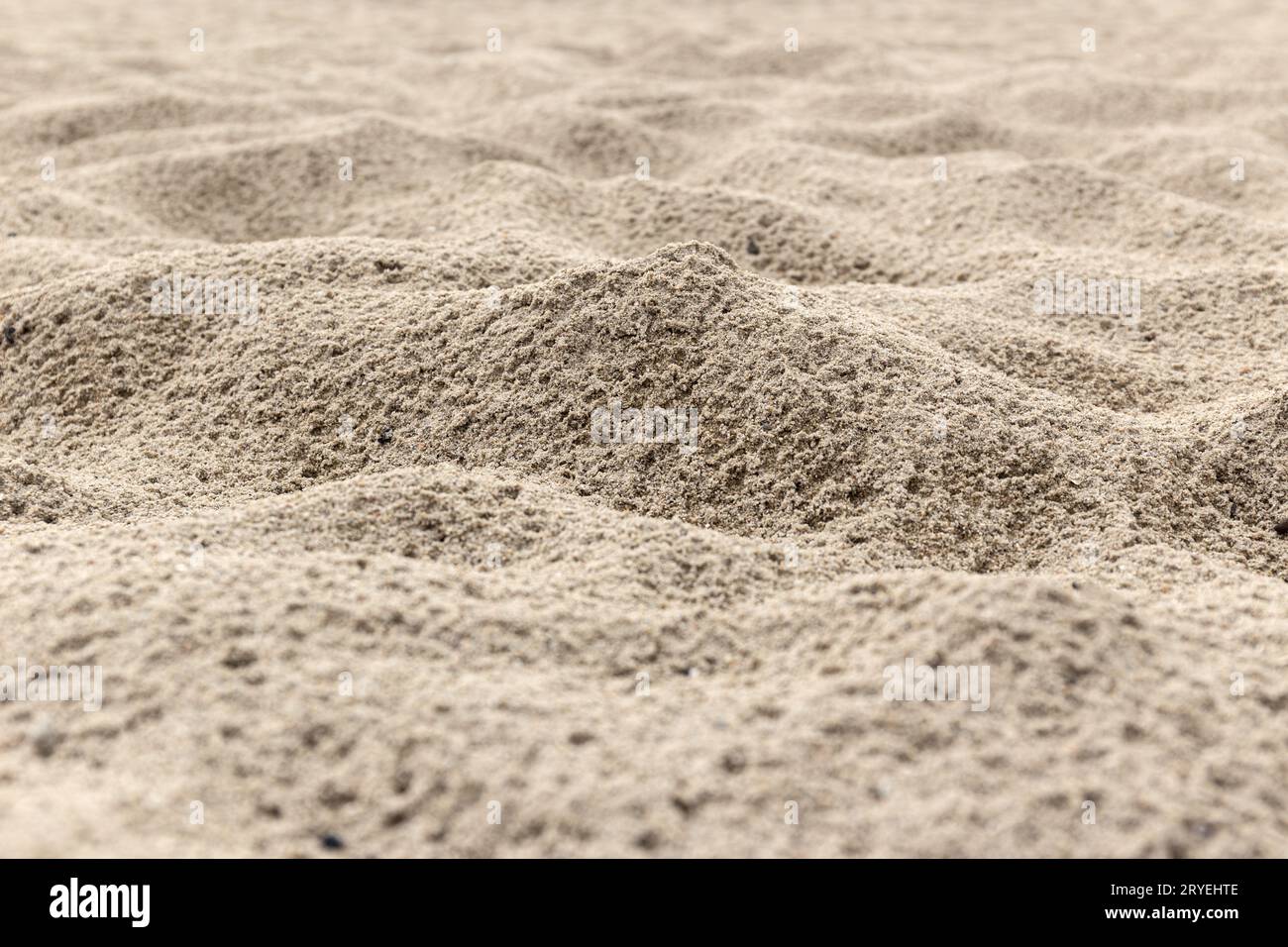 Sand background texture after rain Stock Photo - Alamy
