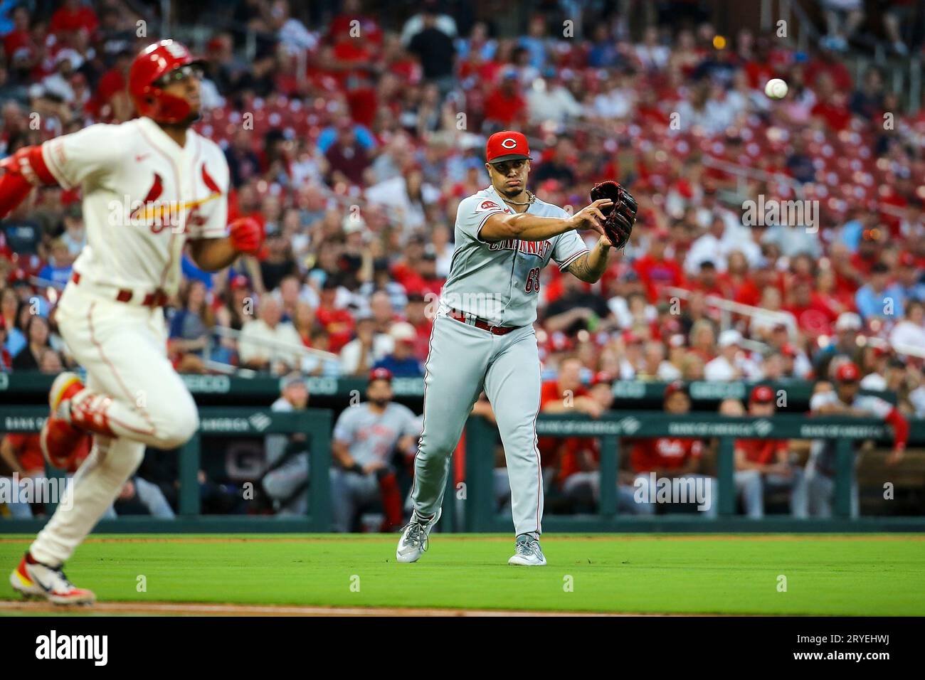 Cincinnati Reds relief pitcher Fernando Cruz throws to first for the ...
