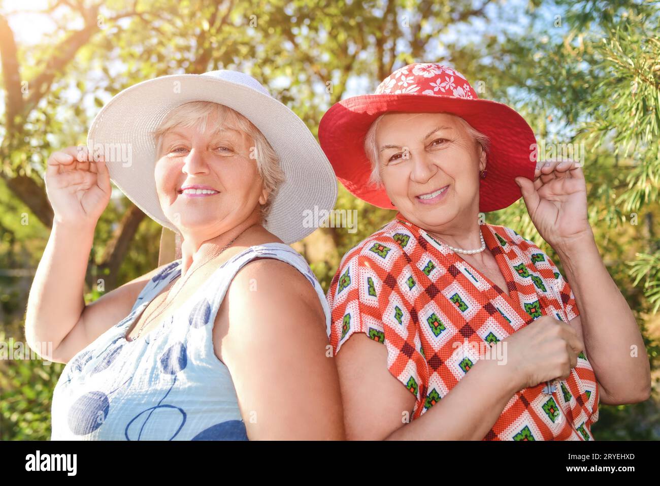Two mature women friends walking hi-res stock photography and images ...