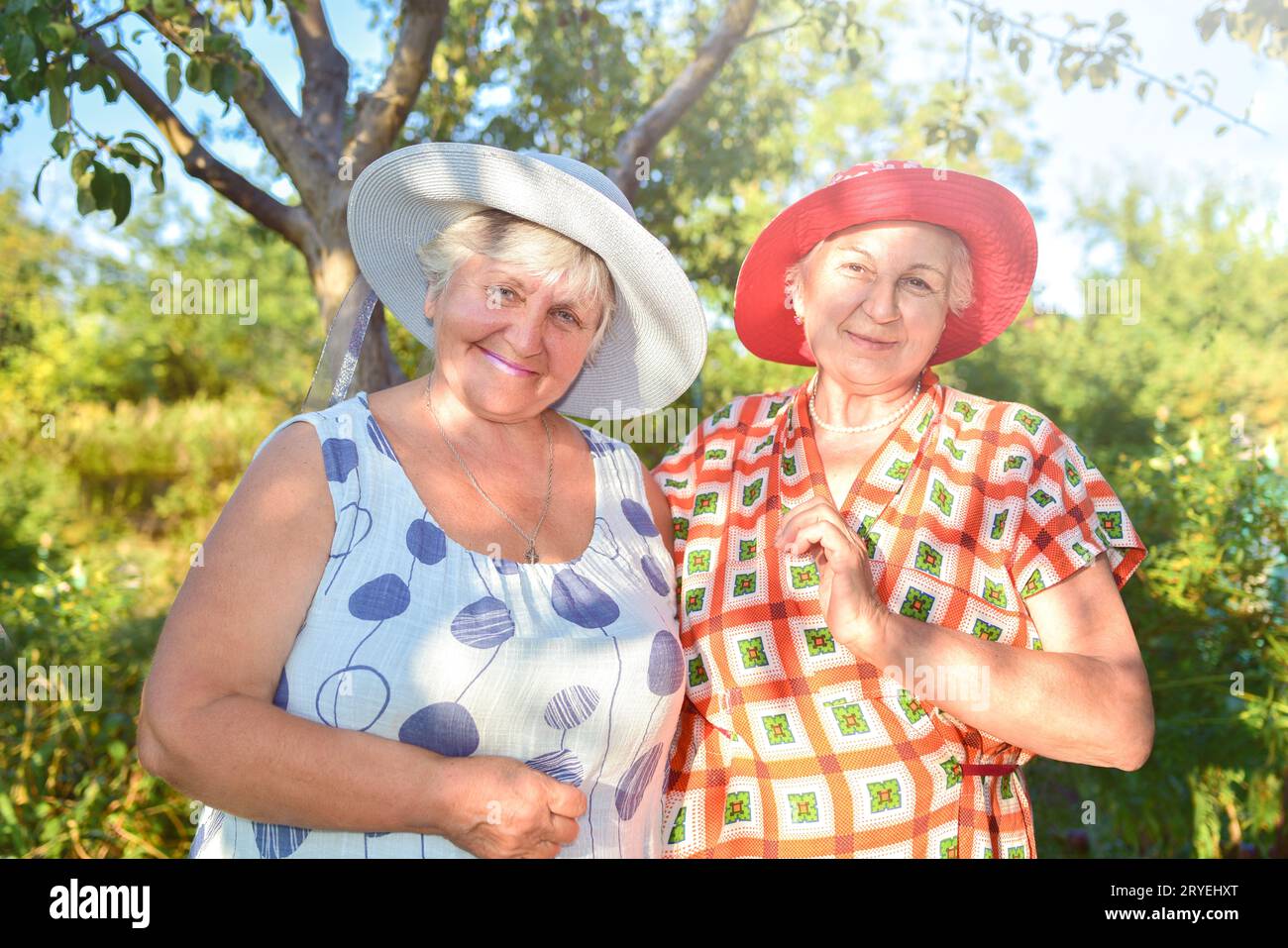 Two mature women friends walking hi-res stock photography and images ...