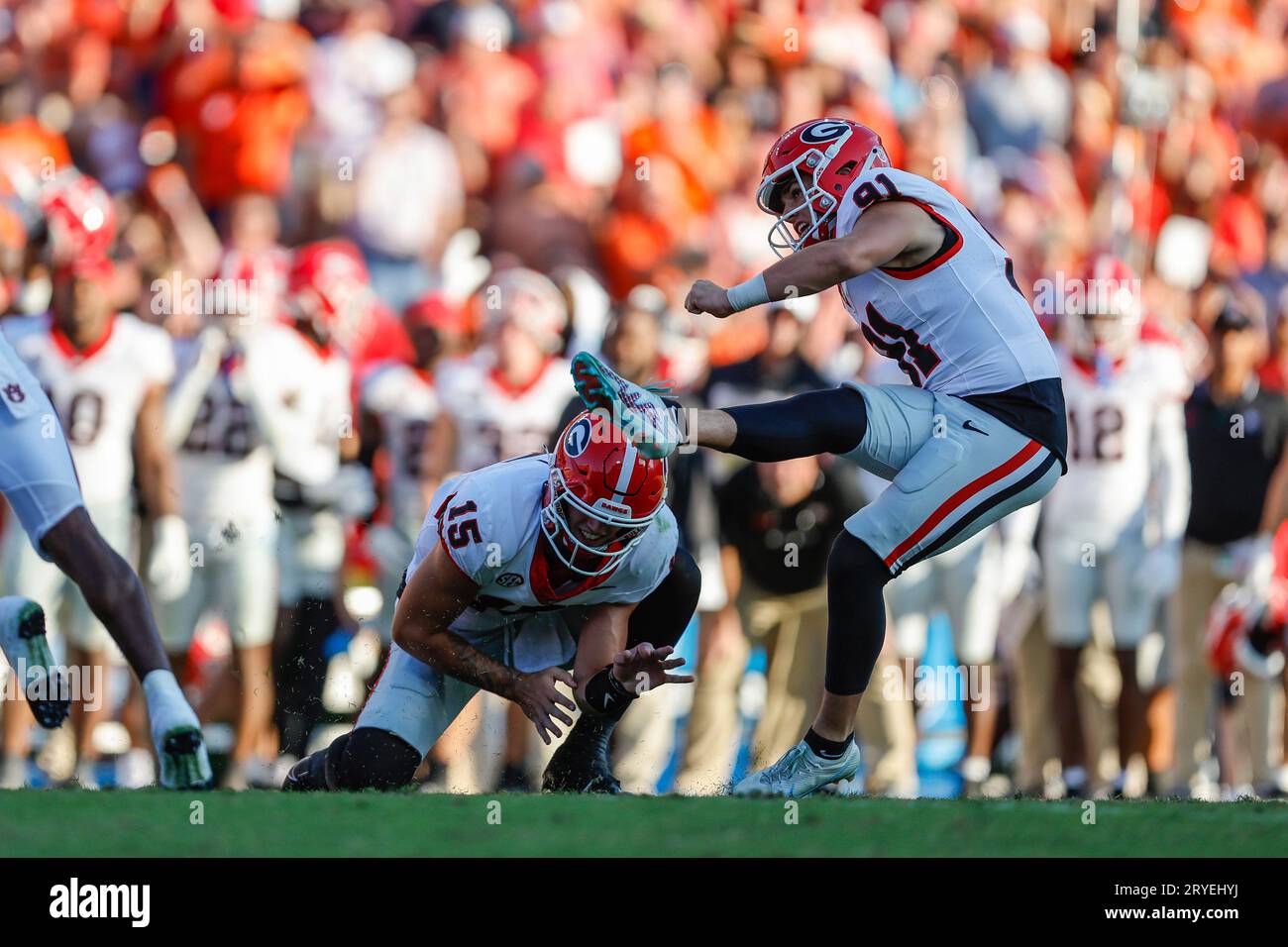 Georgia kicker Peyton Woodring (91) kicks a field goal from the hold by ...